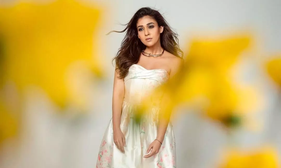 actress nayanthara looks cute and elegant with floral frock pictures on ...